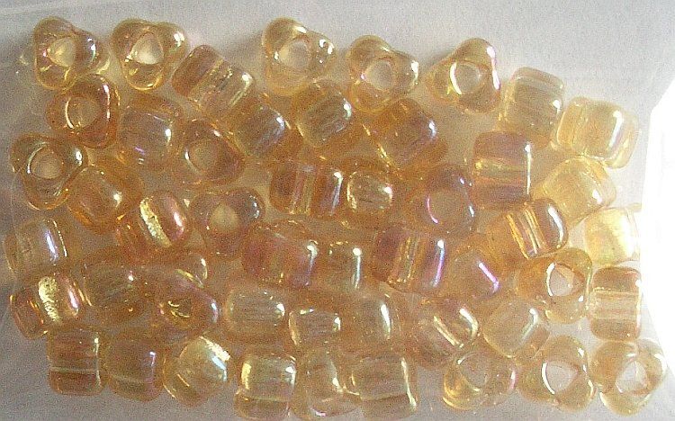 Toho Triangle Beads Topas hell irisierend 3 mm (Neu und ...