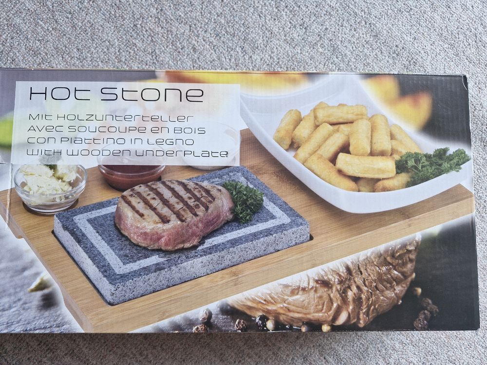 Heisser Stein mit Holzunterteller (Neu (gemäss Beschreibung)) in Remetschwil für CHF 19 – mit ...