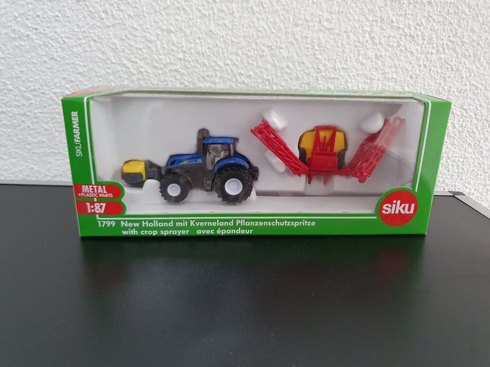 Siku - New Holland mit Pflanzenschutzspritze (Neu und originalverpackt ...