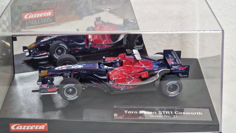 CARRERA EVOLUTION 27163 Toro Rosso STR1 Cosworth DriverNo.21 (Neu und originalverpackt) in ...