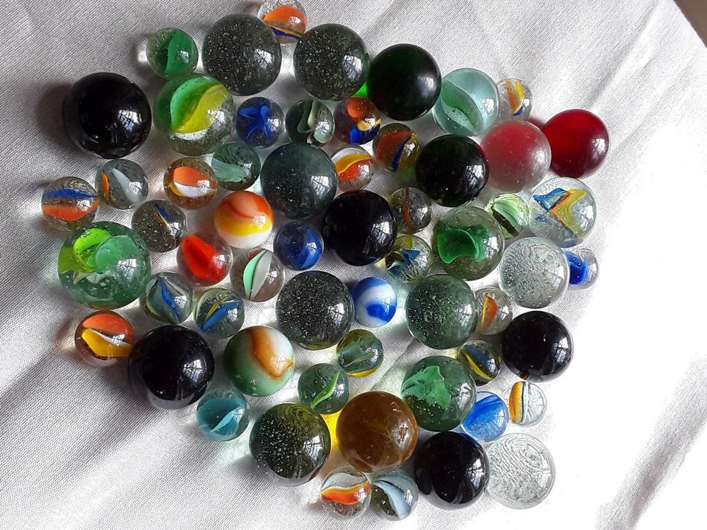 Alte Murmeln 25 gross und 34 klein (Gebraucht) in Zürich für CHF 32 ...