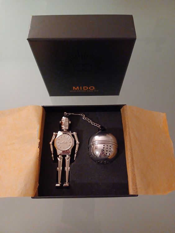 100 Jahre Mido Uhren Roboter Robi und Teesieb | Kaufen auf Ricardo