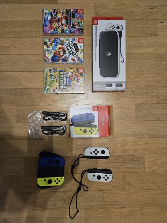 Nintendo SWitch Oled, 3 Spiele, Case teilw. Originalverpackt (Neu und ...