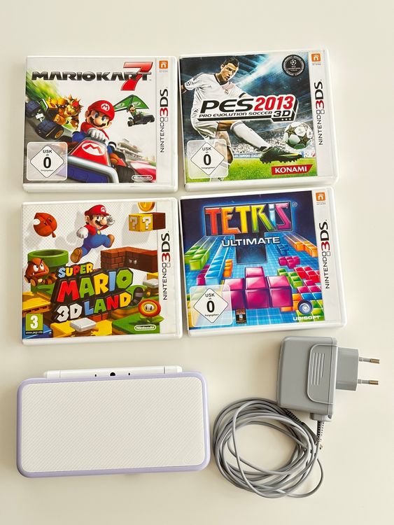 Top: Nintendo New 2DS XL weiss/Lavendel + 4 Spiele | Kaufen auf Ricardo