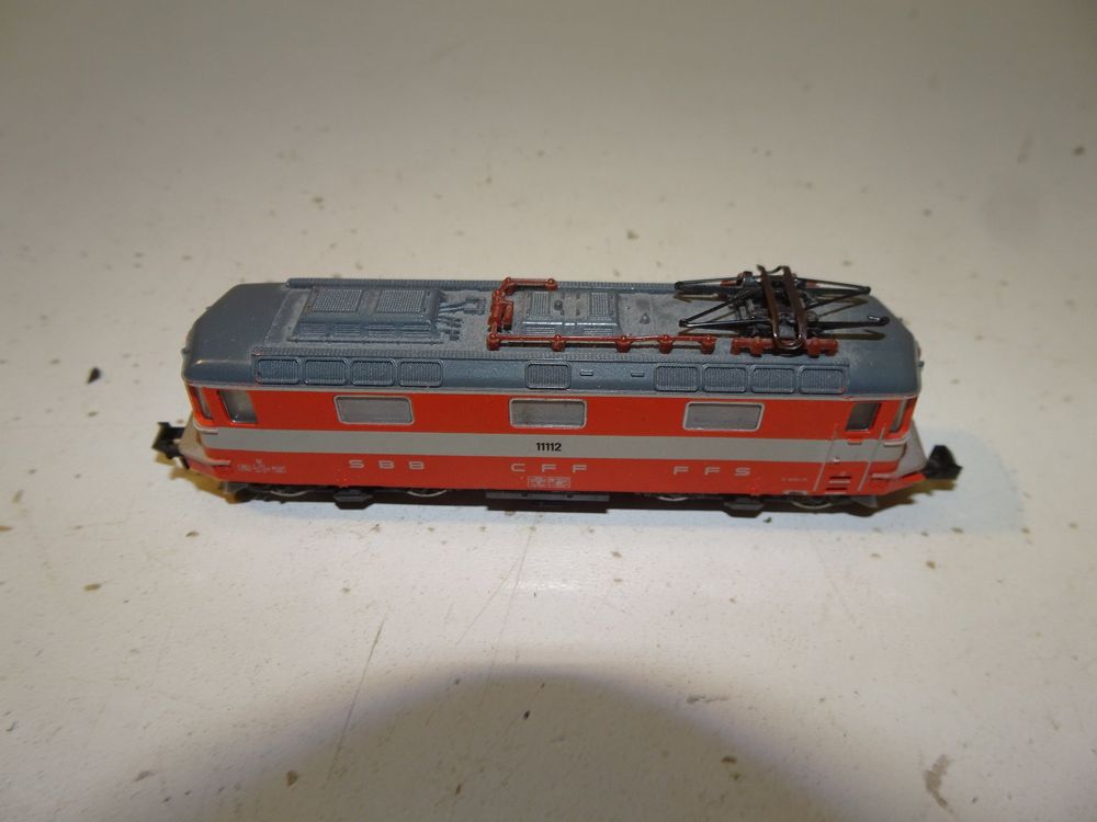 Minitrix Lokomotive SBB 11112 Re 4/4 Spur N Defekt (Defekt) in Emmenbrücke für CHF 41.9 – mit ...