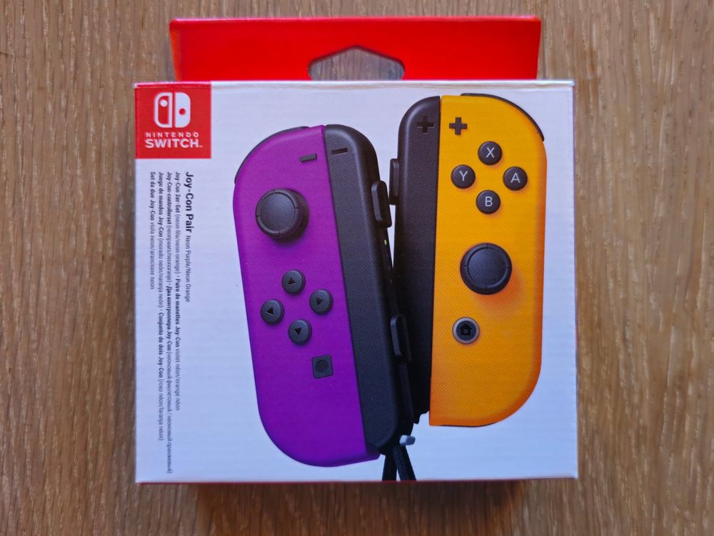 Controller / Nintendo Switch / Joy-Con Set Lila/Orange / OVP (Neu (gemäss Beschreibung)) in ...