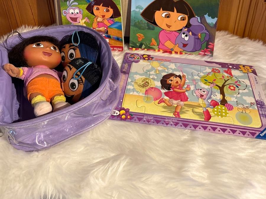 Dora Poupée peluche, Puzzle et 2 jouets Mac Donald (Gebraucht) in Ste ...