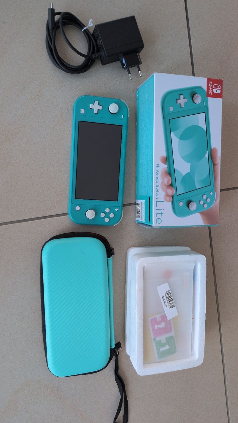 Nintendo Switch Lite (D'occasion) à Bottens pour CHF 92 – avec ...