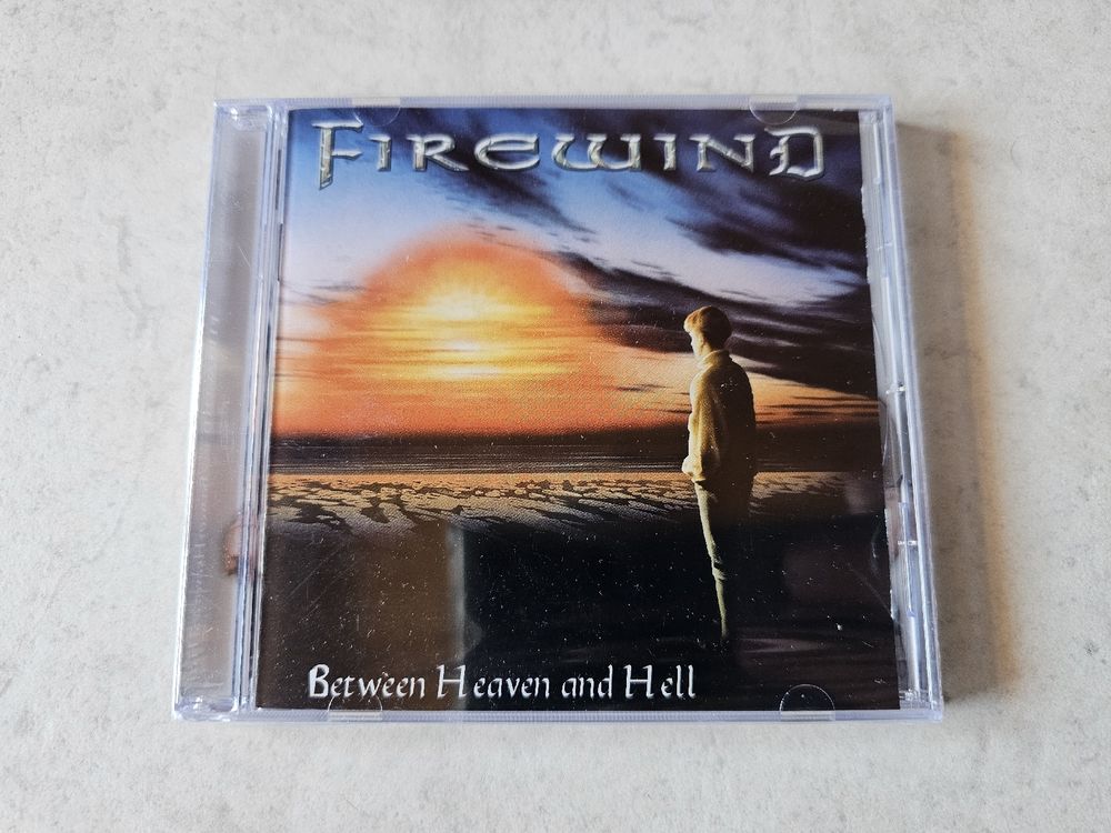 Firewind - Between Heaven And Hell / Fabrikneu | Kaufen auf Ricardo