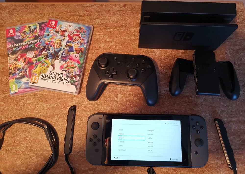 Nintendo Switch + Pro Controller + 2 Games | Kaufen auf Ricardo