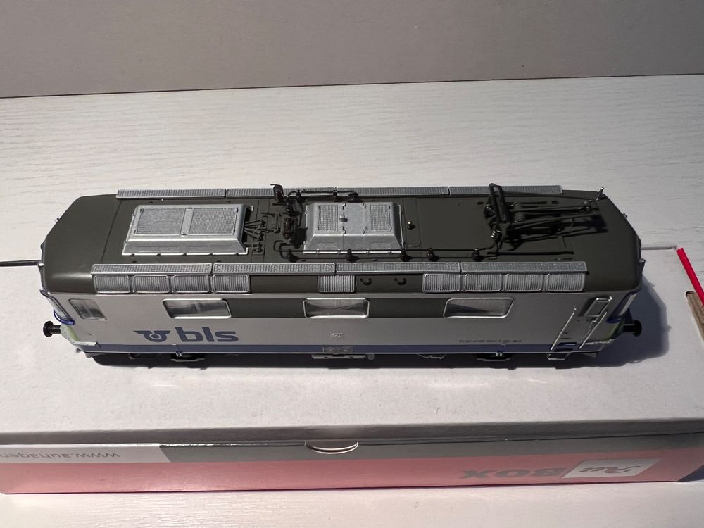 Roco 62691 - Re 420 504 - BLS "Nina" mit Omega-Logo (Défectueux) à ...