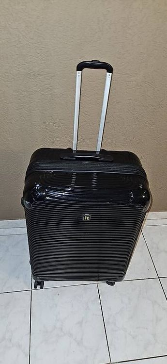 Belle valise noire à roulettes (Gebraucht) in Genthod für CHF 20 – nur ...