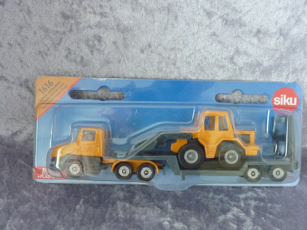 Tieflader mit Frontlader 1616 Siku (Neu und originalverpackt) in Dürrenäsch für CHF 8 – mit ...