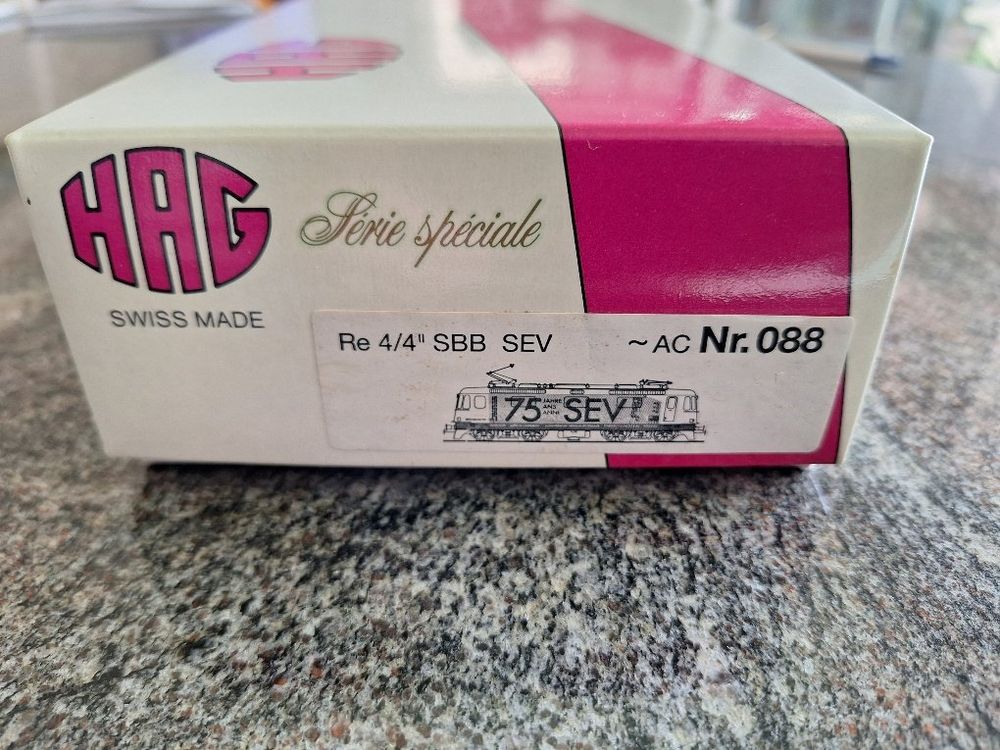 HAG 088 HO. locomotive CFF Re 4/4, 75 ans du SEV, avec boite (Neu und ...