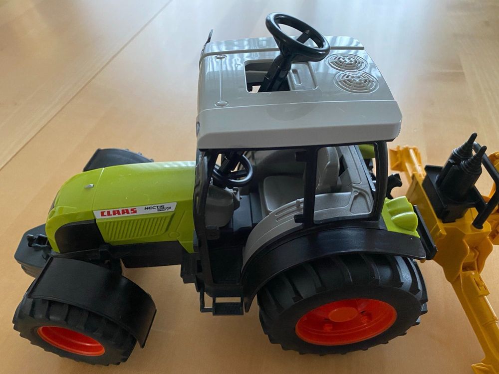 Bruder Traktor + Heckbagger mit Greifer | Kaufen auf Ricardo