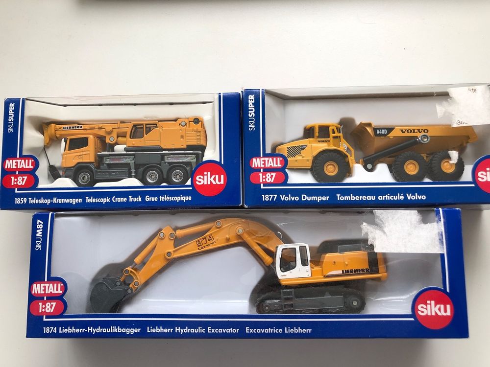 3x Siku 1:87 Baufahrzeuge , Kran Bagger Dumper (Gebraucht) in Jonschwil für CHF 38 – mit ...