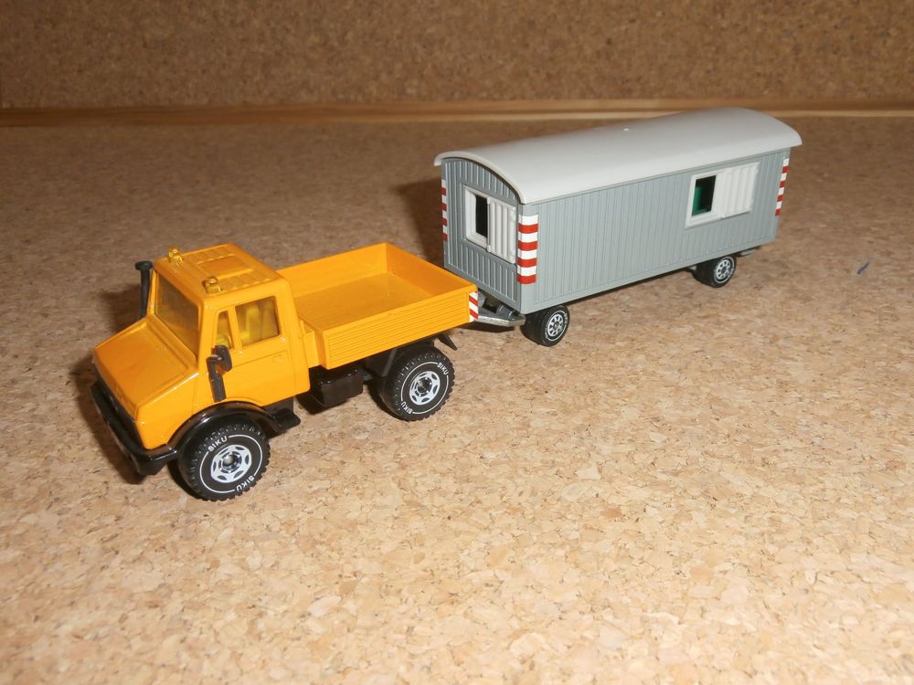 SIKU 2519 Unimog U 1500 mit Bauwagen (Neu und originalverpackt) in ...