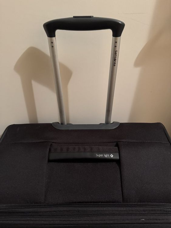 Superlight Samsonite Koffer auf 4 Rollen und Schloss (Gebraucht) in ...