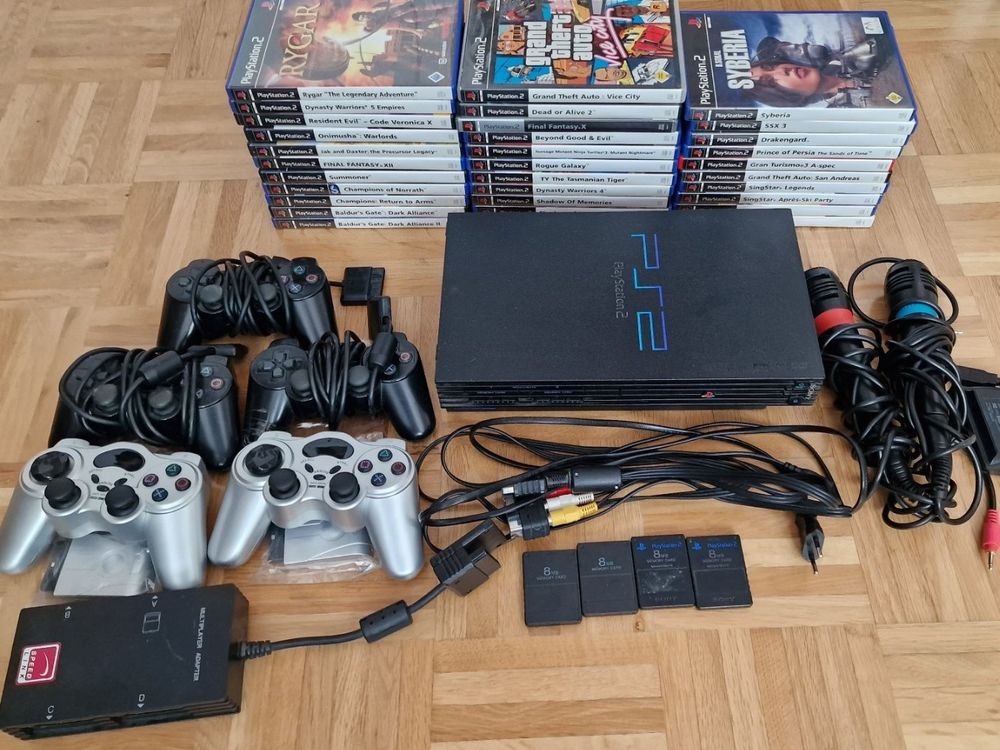 PS2 Megapack mit 32 Spielen (Gebraucht) in Heiligkreuz (Mels) für CHF 200 – nur Abholung auf ...