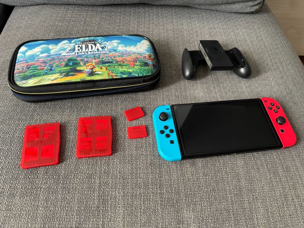 Nintendo Switch Oled + 10 jeux + manettes pro et gamecube | Kaufen auf ...