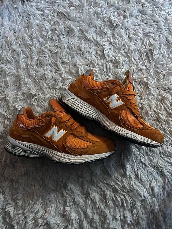 New balance 2002r orange protection pack (Gebraucht) in Plan-les-Ouates ...