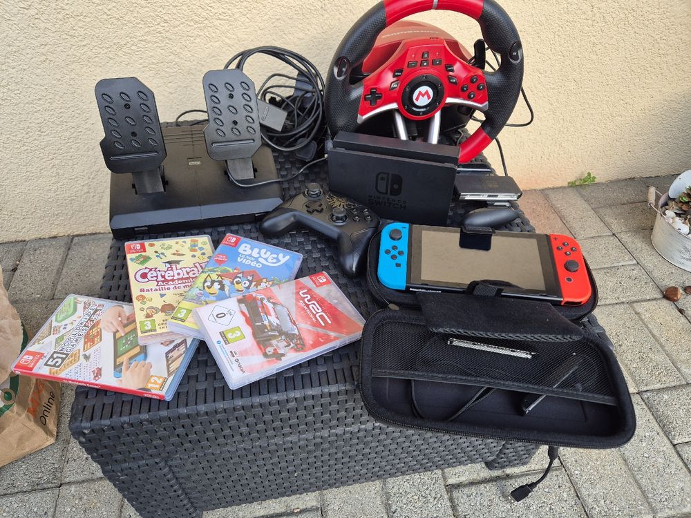 Nintendo Switch + manette + volant Mariokart + 4jeux (Neuf (Voir ...