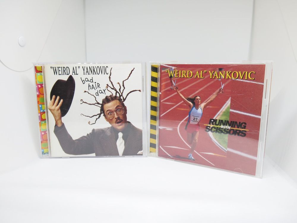 2 CDs Weird Al Yankovic Bad Hair Day + Running With Scissors | Kaufen ...