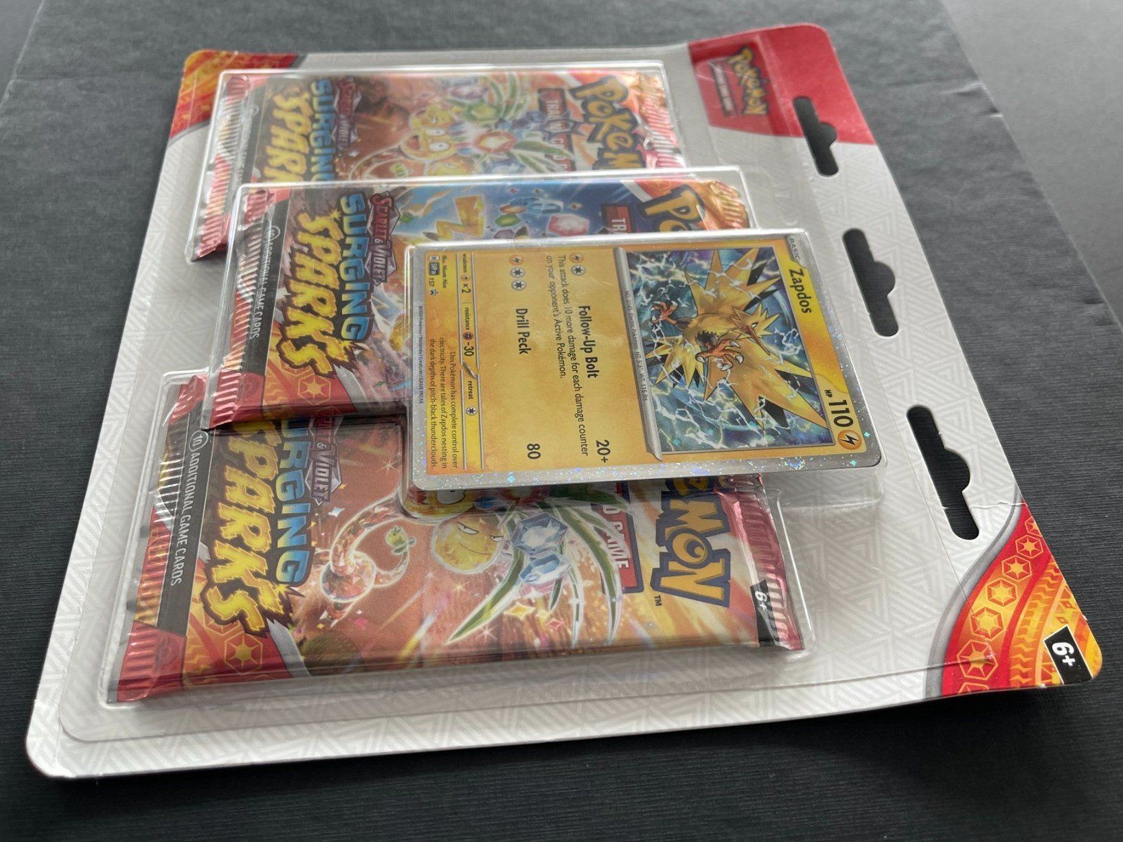 Pokémon SV08 Surging Sparks 3 Pack Blister Zapdos EN (Neuf (Voir ...