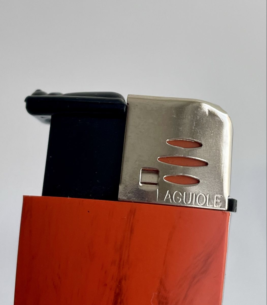 Briquet Laguiole orange avec sa housse en velour (D'occasion) à Genève ...