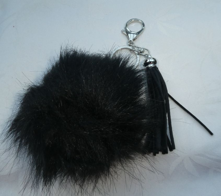 Porteclé pompon noir neuf (Neu und originalverpackt) in Troistorrents ...