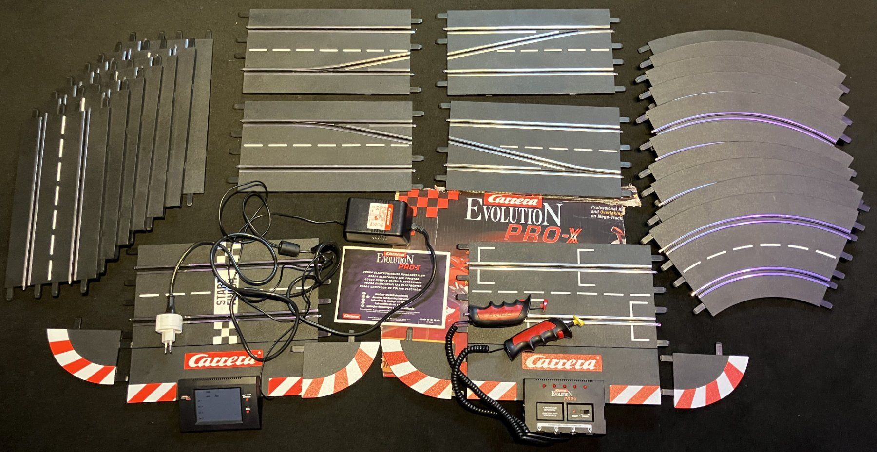 Carrera Evolution PRO-X Rennbahn + Rundenzähler (ohne Autos) (Gebraucht) in Ebikon für CHF 49 ...