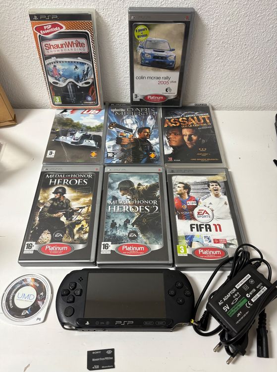 Psp Street e1004 noir + 8 jeux + 1 film + carte SD 1gb (D'occasion) à ...