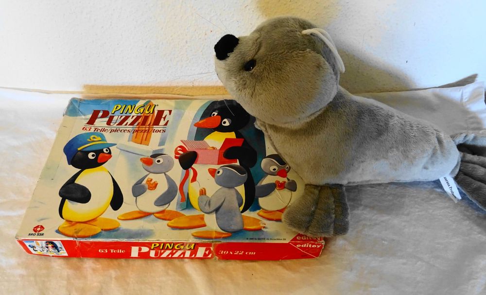 Pingu Puzzle 63 Teile + Robby Kuscheltier (Gebraucht) in Zürich für CHF ...