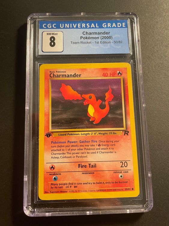 Charmander Team Rocket 1st Edition 50/82 CGC 8 | Kaufen auf Ricardo