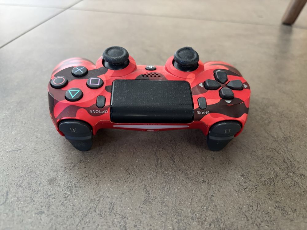 Manette PS4 + deux jeux (D'occasion) à Corpataux pour CHF 20.95 – avec ...