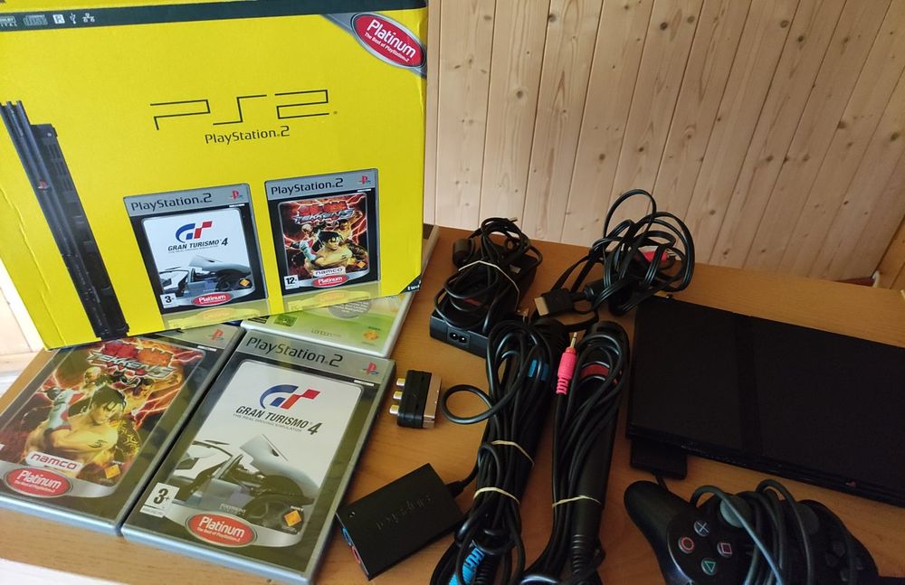 Ps2 Konsole + Controller, Mikrofone Games & SingStar (Gebraucht) in ...