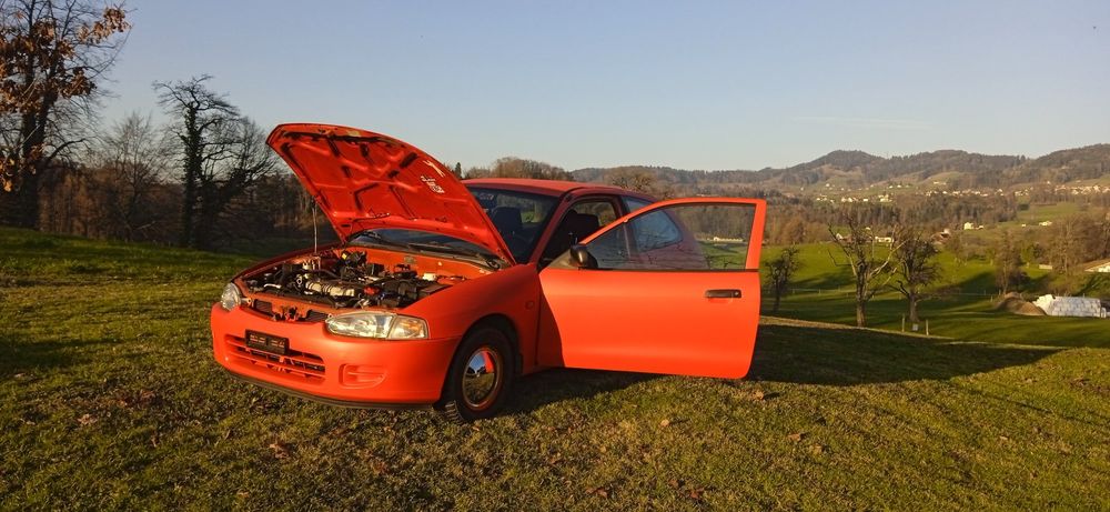 Mitsubishi Colt 1.3i 1998 Raptorlack rot Moon equipped | Kaufen auf Ricardo