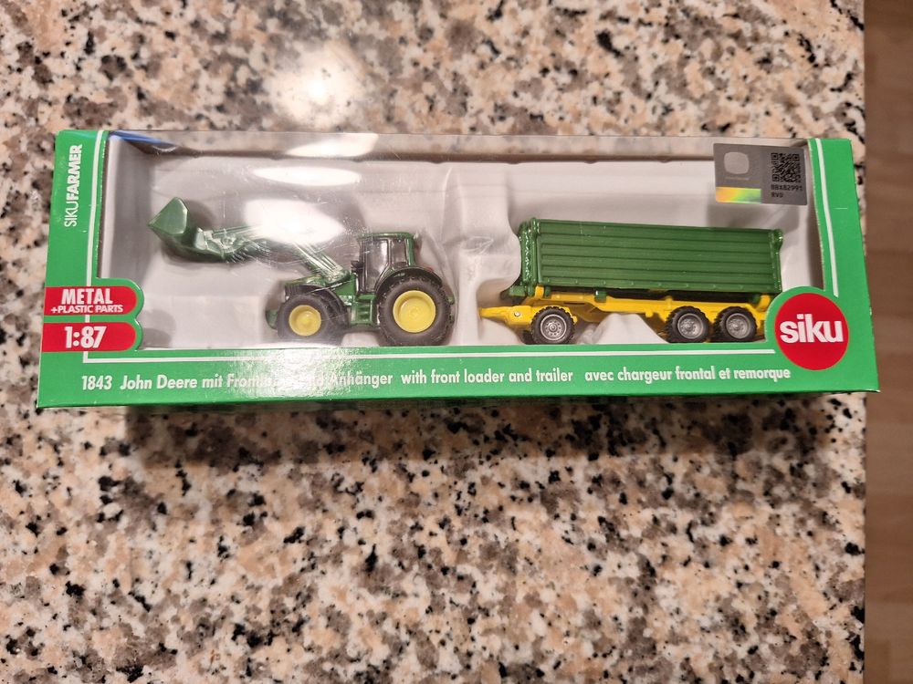 John Deere mit Frontlader und Anhänger (Neu und originalverpackt) in Wanzwil für CHF 9 – mit ...