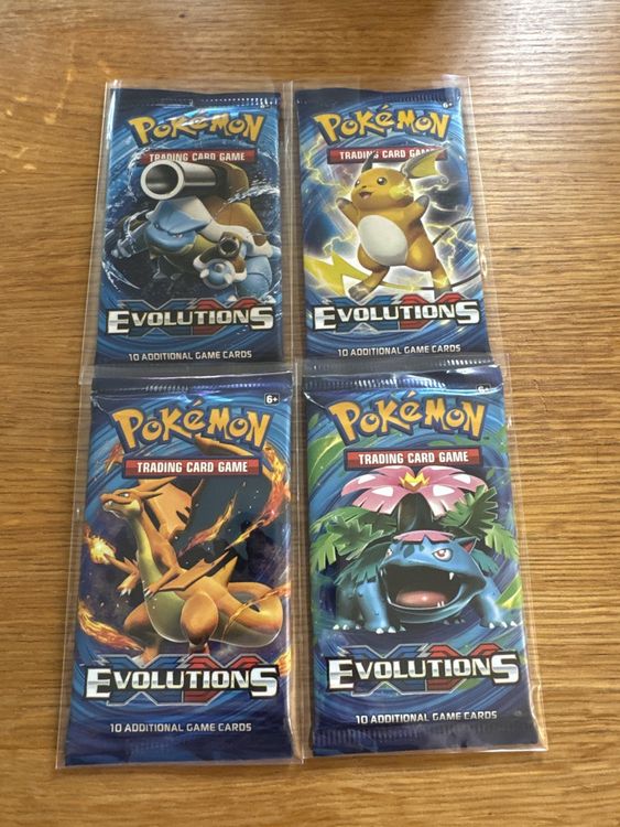 4 Pokémon Evolution Booster Packs TCG OVP (Neu und originalverpackt) in ...