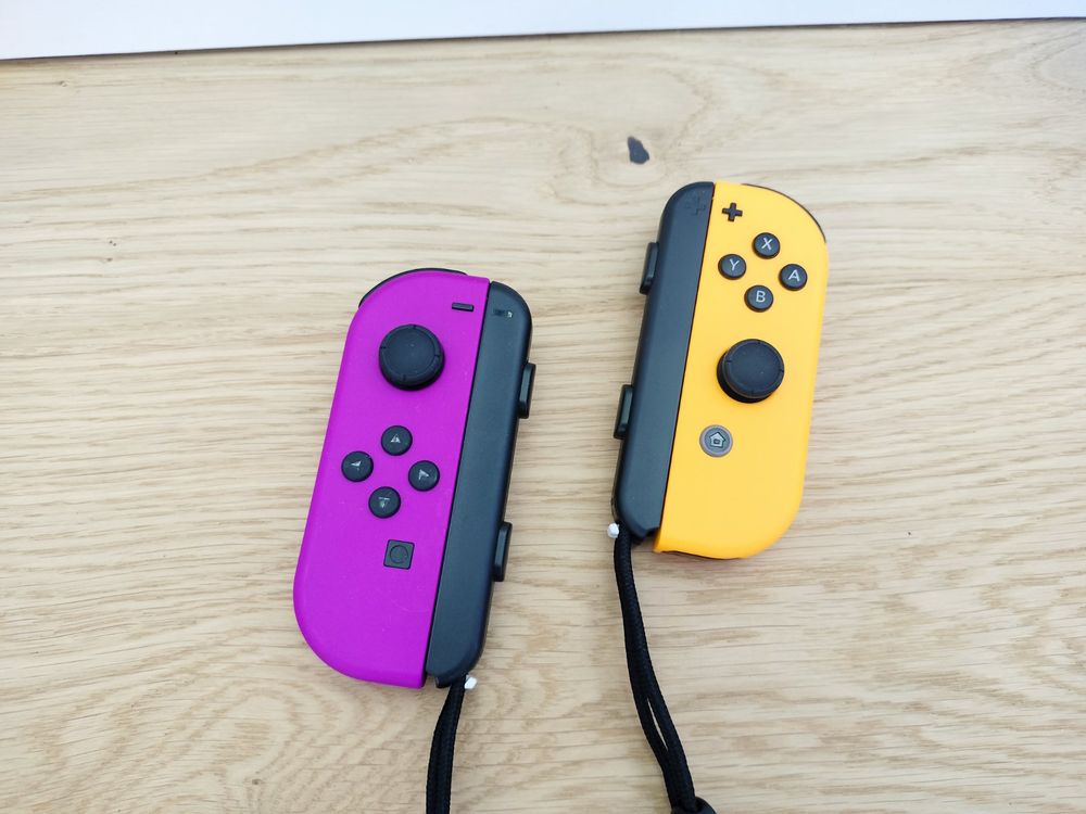 Nintendo Switch Joy-Cons violet/orange (Gebraucht) in Wil SG für CHF 36 ...