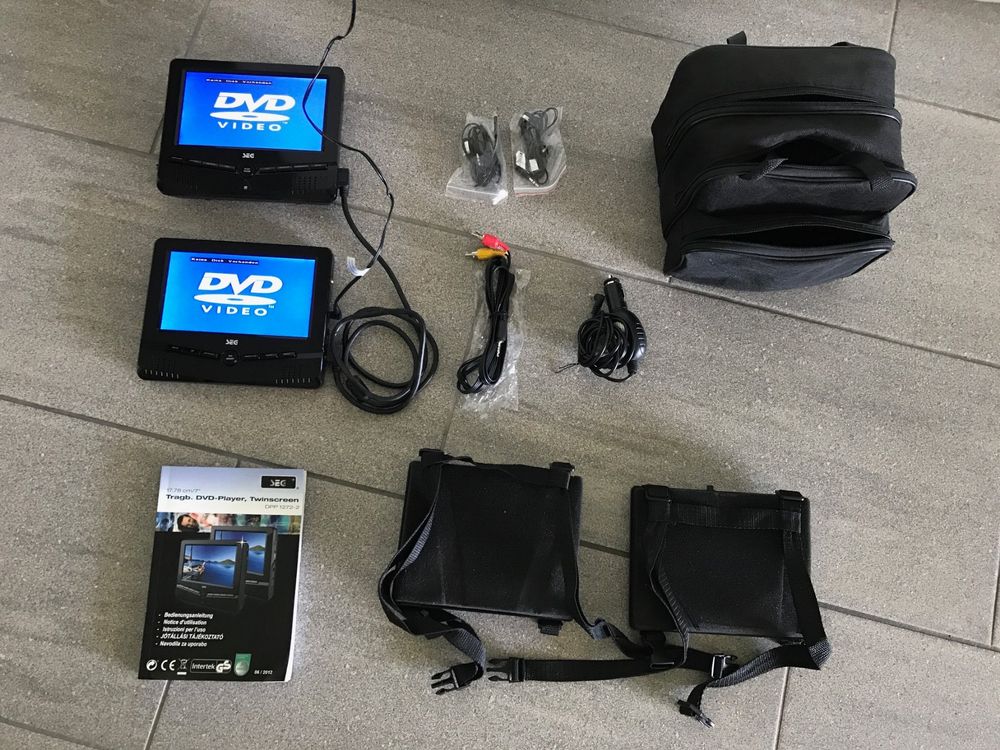 Tragbarer DVD Player Twin-Screen SEG + Befestigung für Auto (Gebraucht ...
