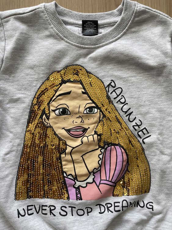 Rapunzel (Disney) Pullover | Gr. 110 | Pailletten (Gebraucht) in Schlieren für CHF 2 – mit ...