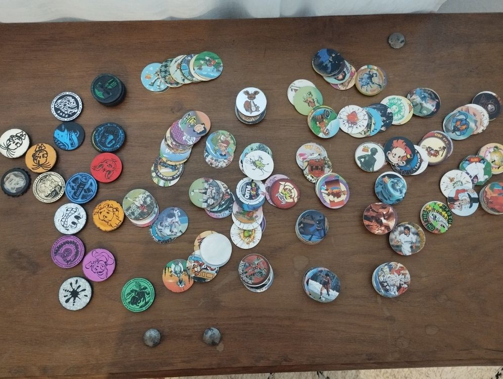 220 pogs originales + 21slammers années 90 (D'occasion) à pour CHF 50 ...