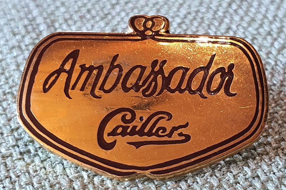 E797 - Pin Mondo - Ambassador Cailler (Gebraucht) in Reinach BL für CHF ...