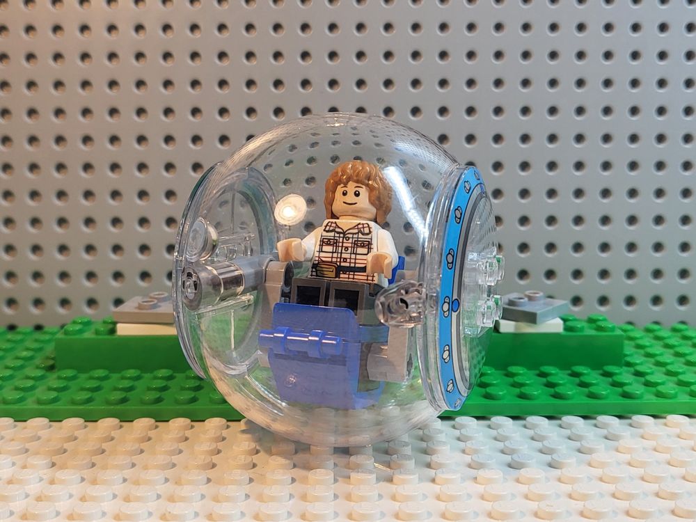 1 Lego-Minifigur Gray Mitchell in der Kapsel, im Kreisel (Gebraucht) in ...