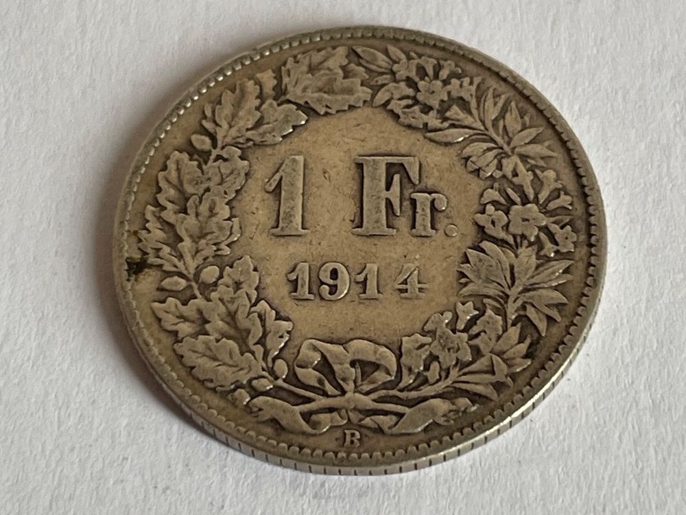Superbe pièce 1Fr. HELVETIA 1914 en argent (Gebraucht) in Erde für CHF 5 – mit Lieferung auf ...