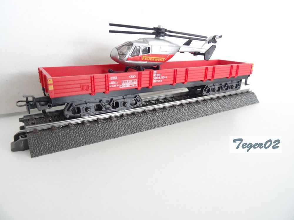 Märklin H0 4473 Niederbordwagen mit Helikopter (Gebraucht) in Hochdorf für CHF 22 – mit ...