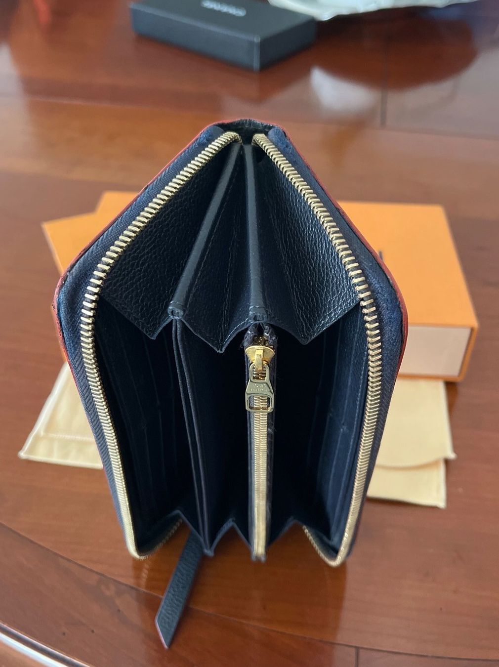 Portefeuille Louis Vuitton Empreinte cuir Navy Blue (D'occasion) à ...