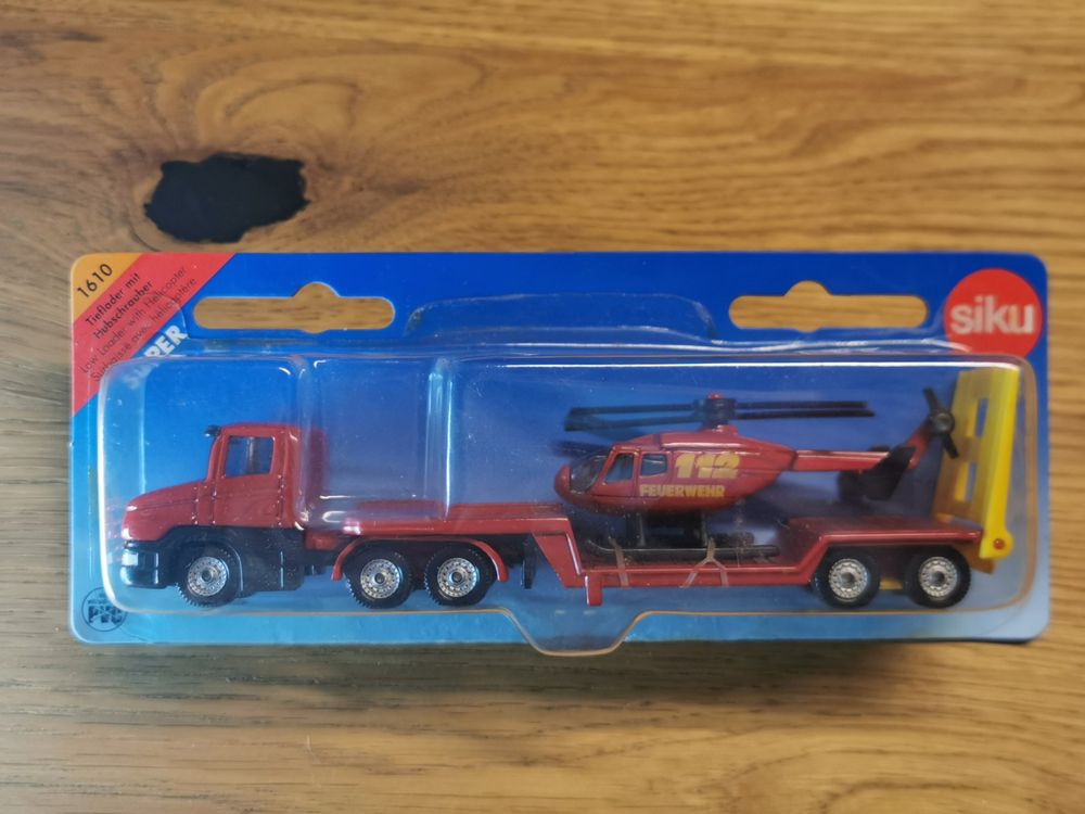 Scania, Tieflader mit Hubschrauber, 1:87 (Neu und originalverpackt) in Reiden für CHF 5 – mit ...
