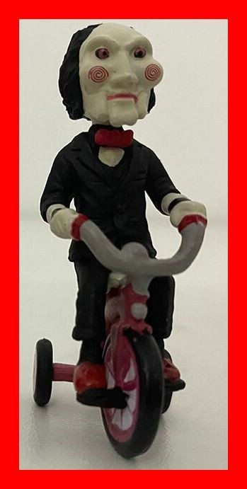 Saw Figur Jigsaw Fahrrad Doll Film Horror Splatter DVD 1 2 3 | Acheter sur Ricardo